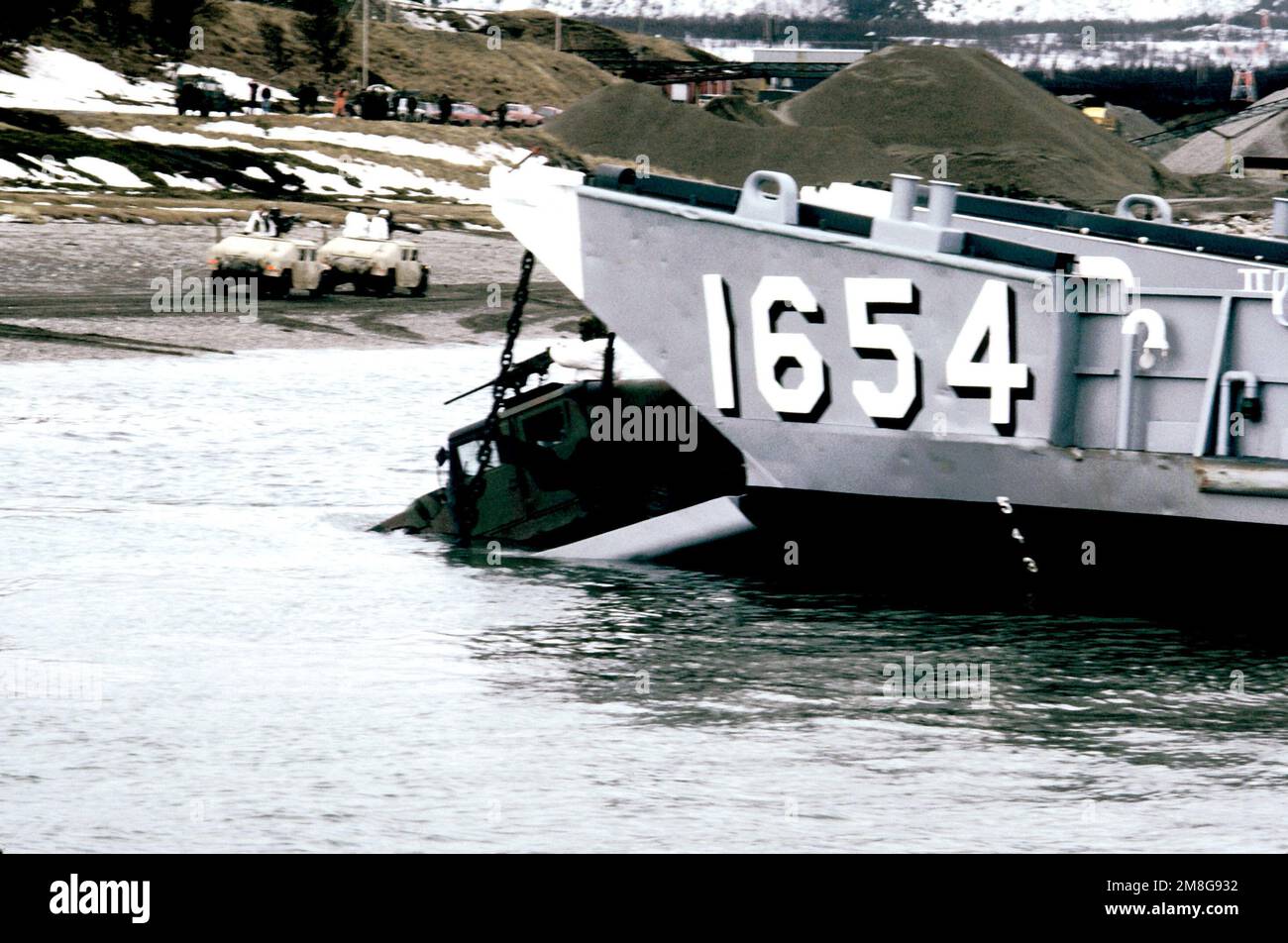 A U.S. Marine Corps M998 High-Mobility Multipurpose Wheeled Vehicle ...