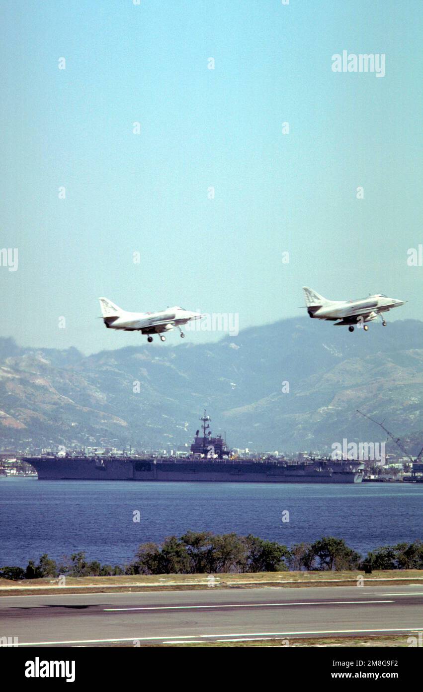 A-4 Skyhawk aircraft fly near the aircraft carrier USS INDEPENDENCE (CV ...