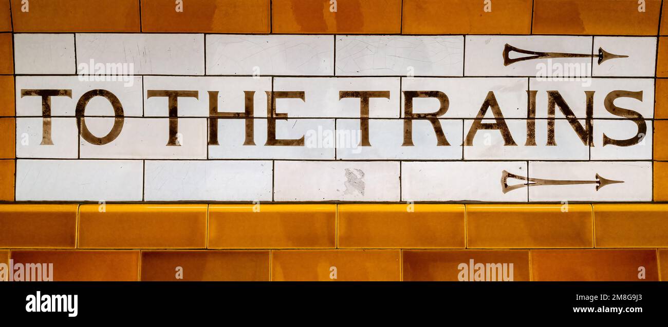 London, UK - 5th January 2023: Art deco To The Trains tiled sign at ...