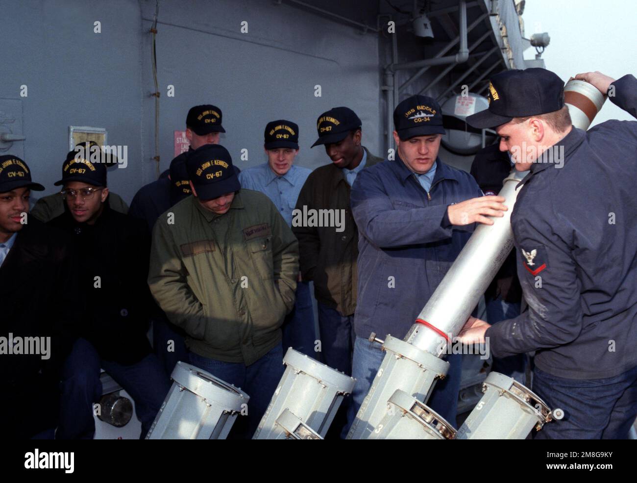 A member of the Super Rapid Bloom Offboard Chaff (SRBOC) reloading crew ...