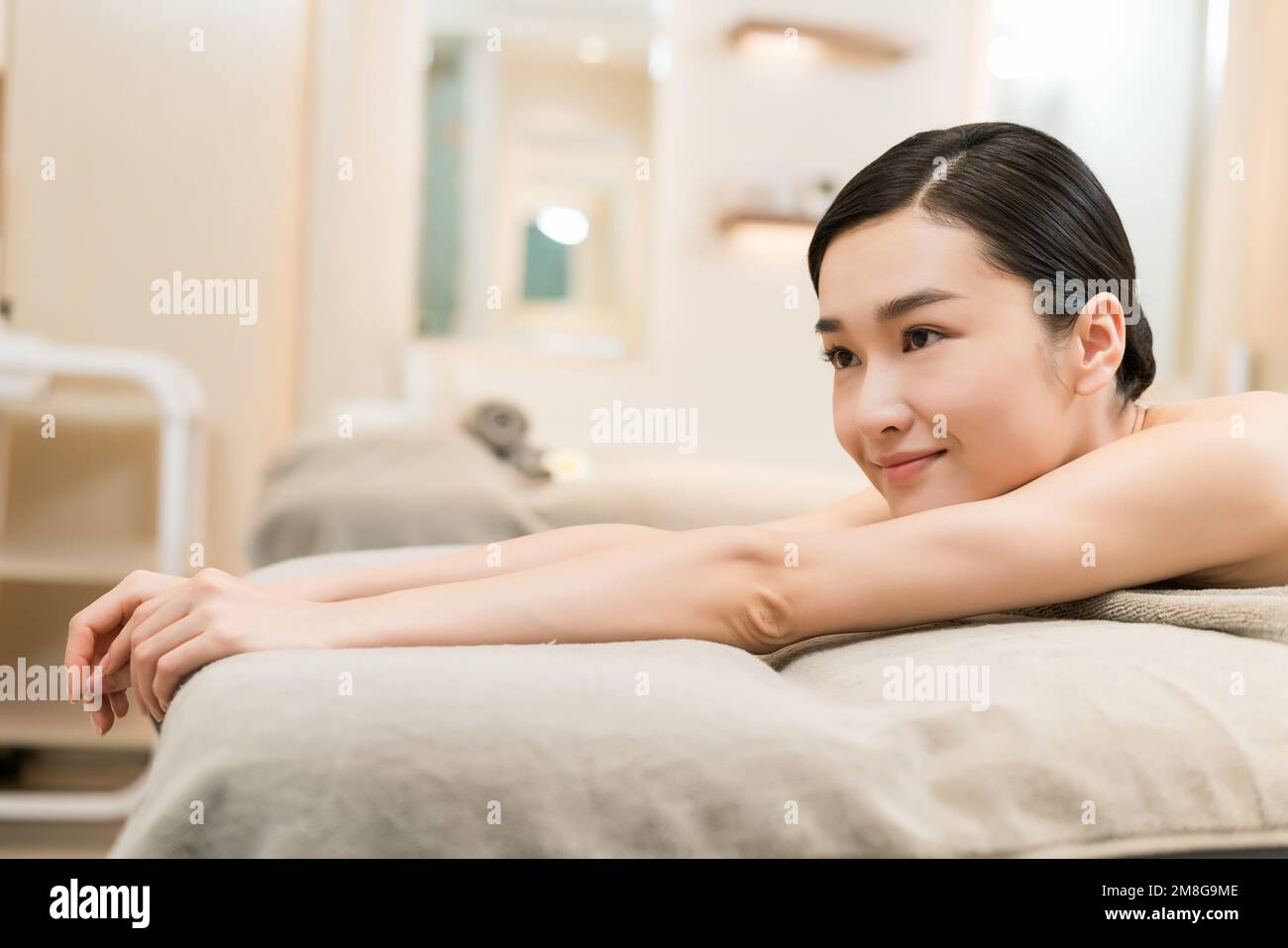 A facial young woman Stock Photo - Alamy