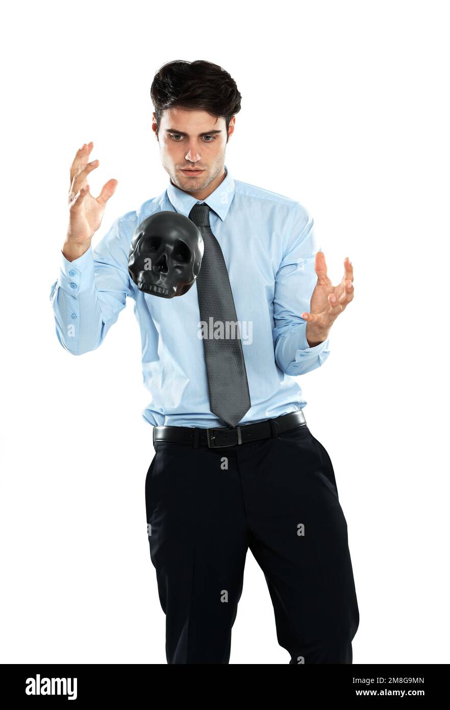 Business man, levitation and black skull in studio isolated on a white ...