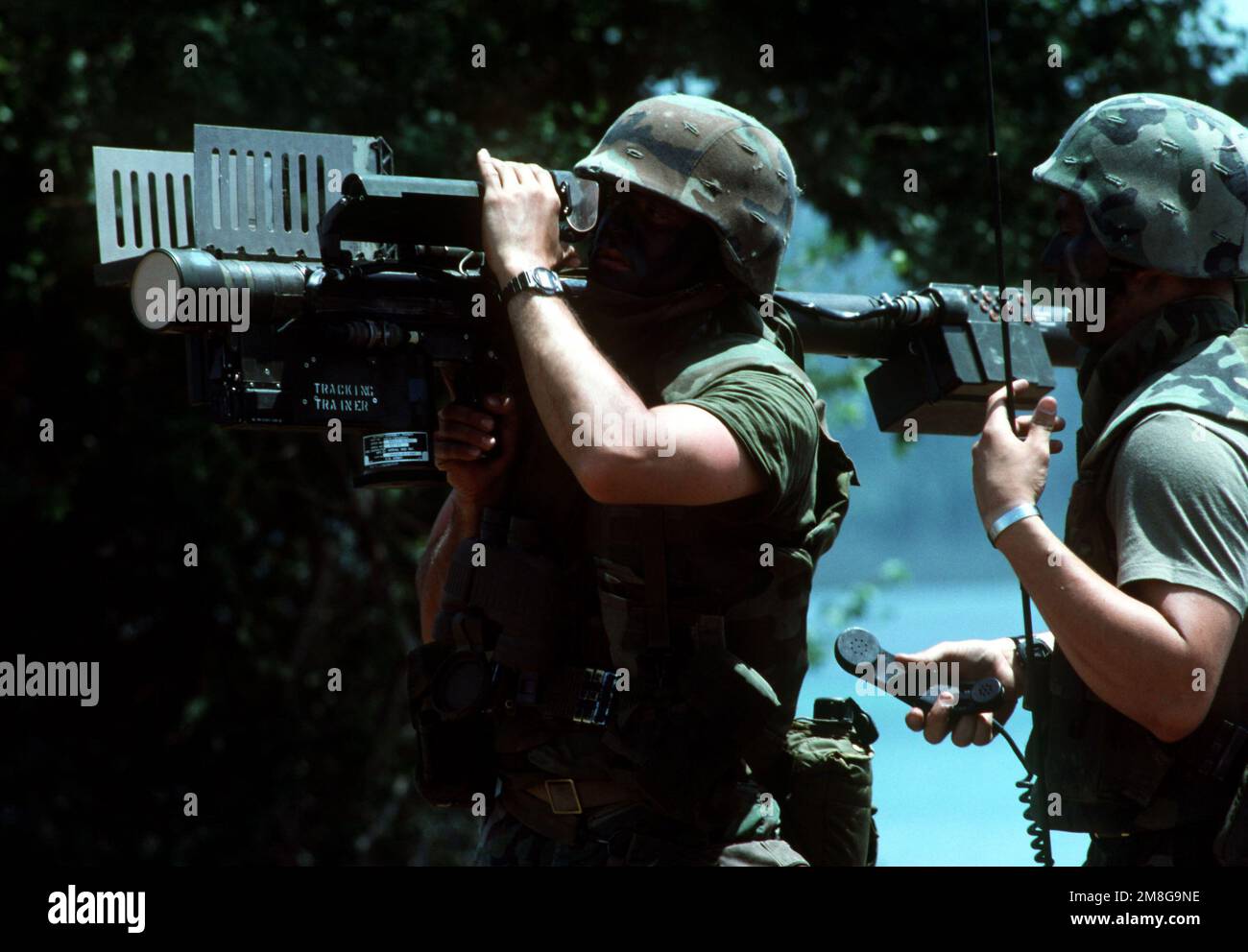 PFC Paul Whitacer sights an FIM-92A stinger portable anti-aircraft ...