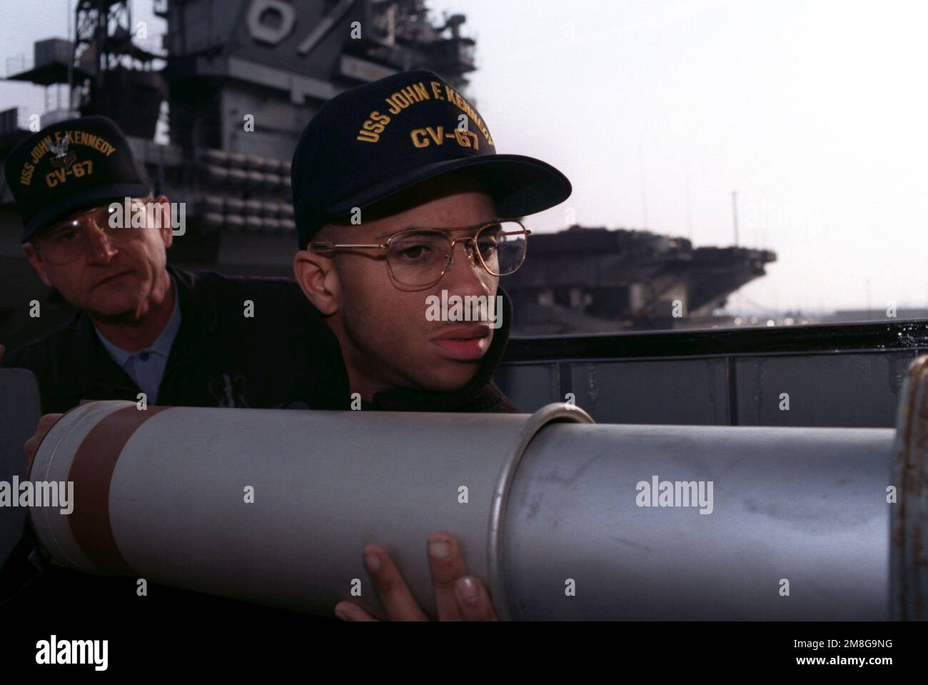 A member of the Super Rapid Bloom Offboard Chaff (SRBOC) reloading crew ...