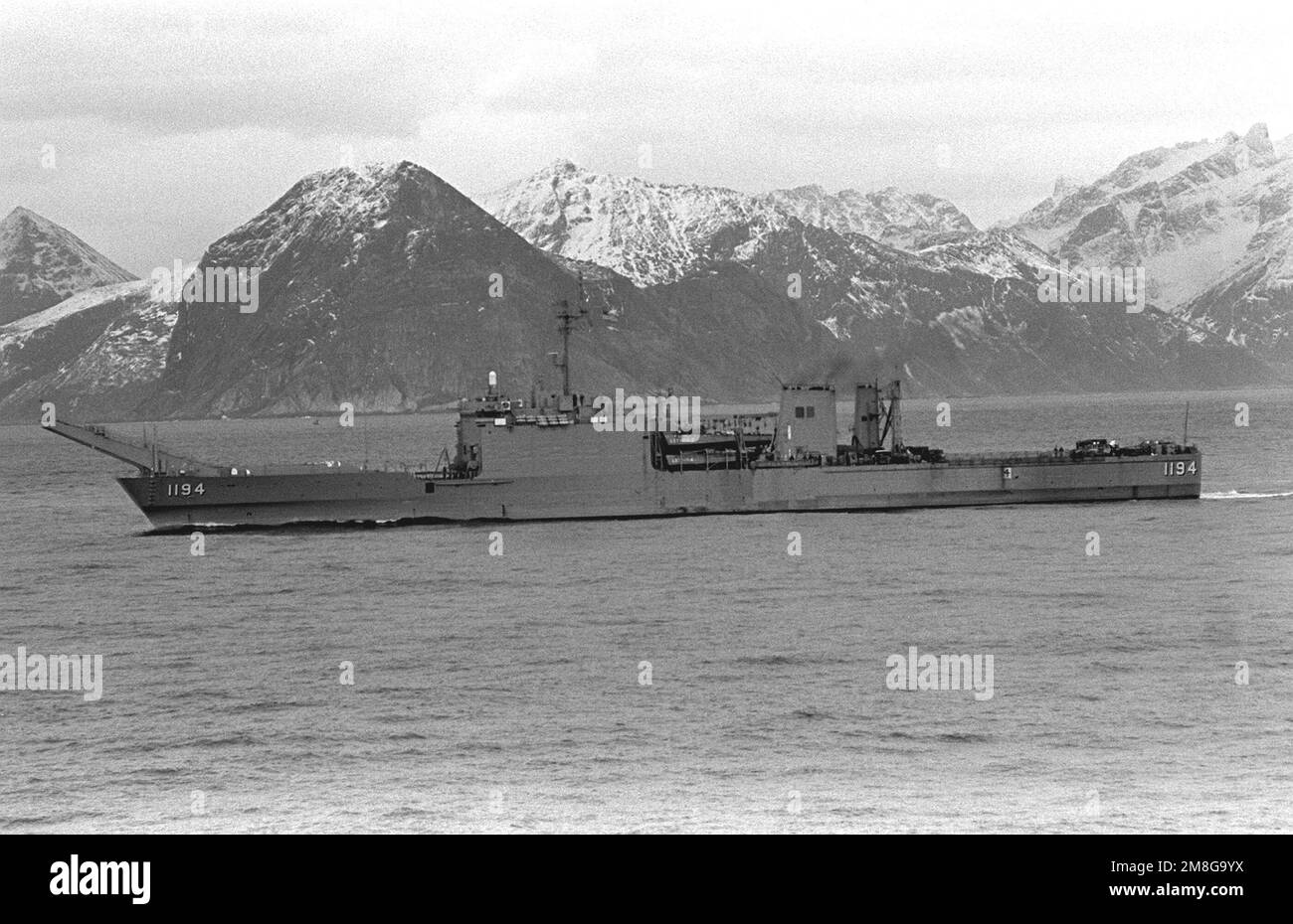 A port side view of the tank landing ship USS LAMOURE COUNTY (LST-1194 ...