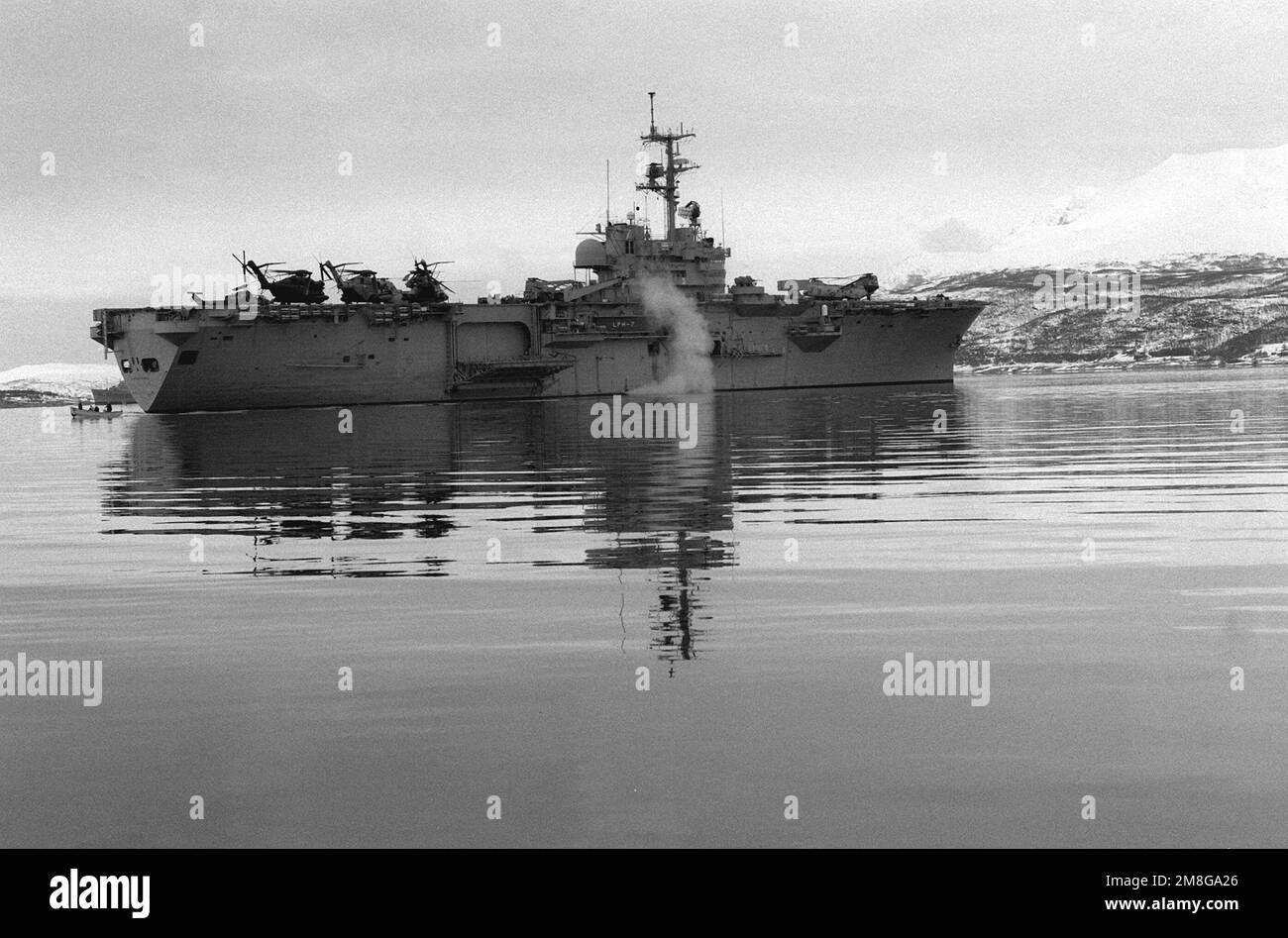 A starboard quarter view of the amphibious assault ship USS GUADALCANAL ...