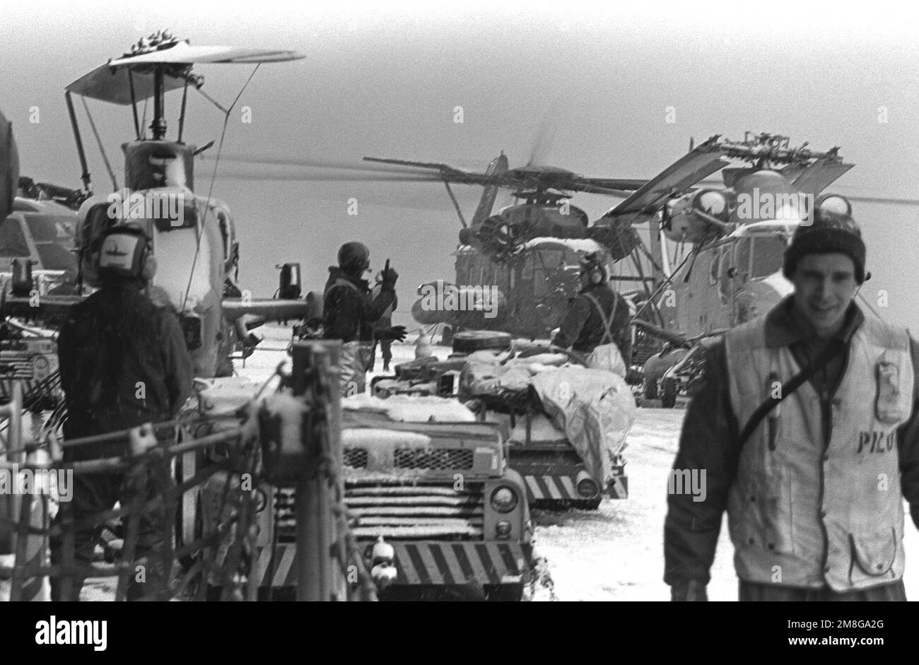 Flight deck personnel are confronted by yet another snow storm as the ...