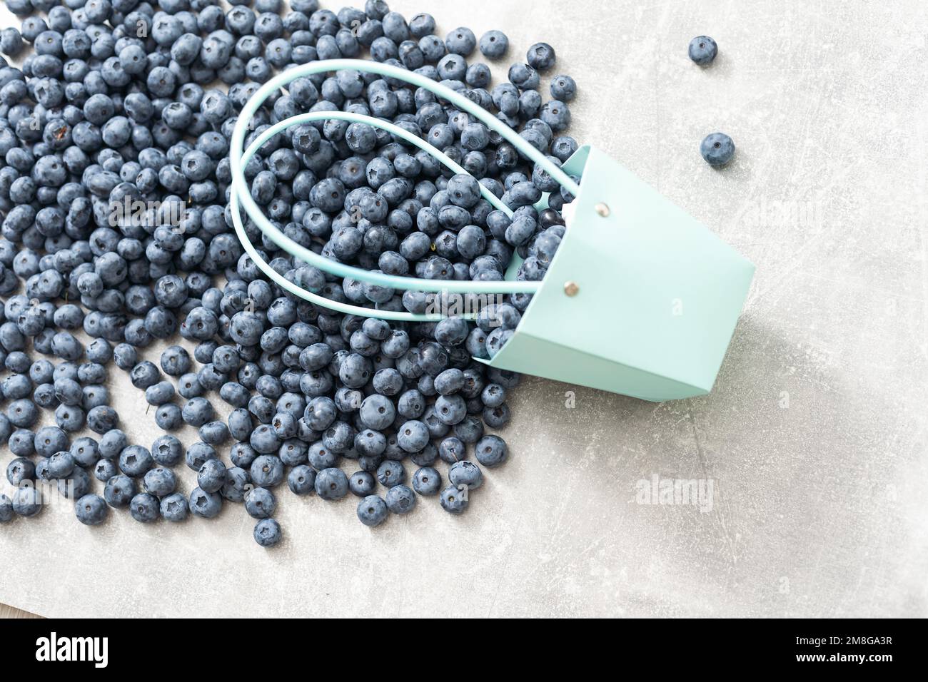 large blueberry with paper basket Stock Photo - Alamy