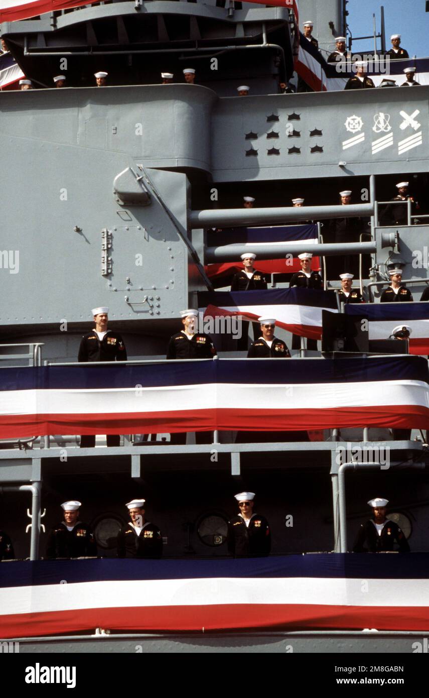 The crew of the USS MISSOURI (BB 63) mans the rails during the ...