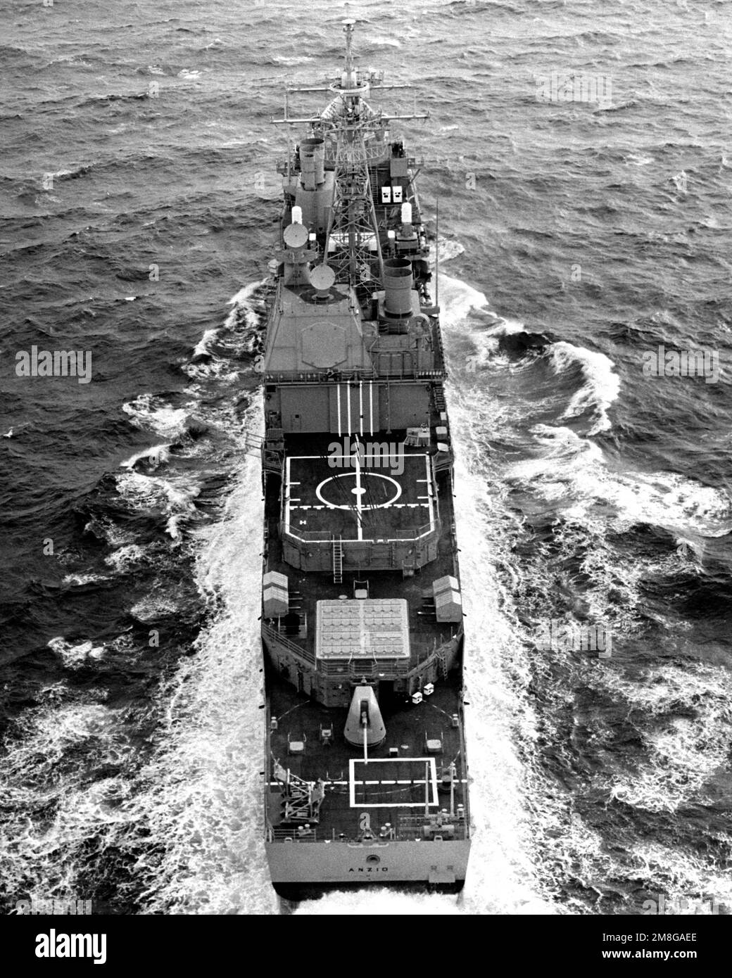 A stern view of the guided missile cruiser USS ANZIO (CG-68) underway ...