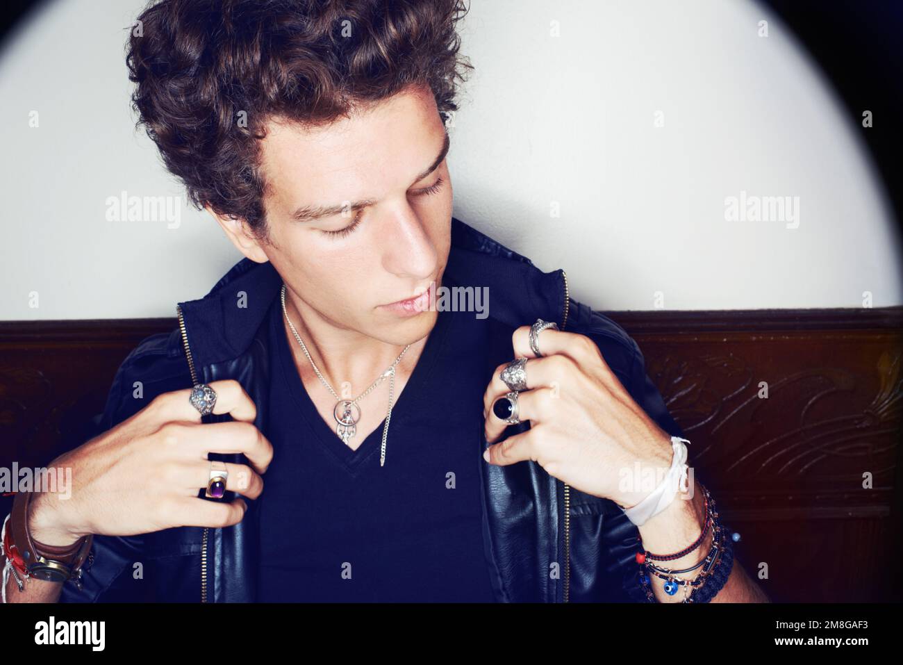 Young man checking spotlight hi-res stock photography and images - Alamy