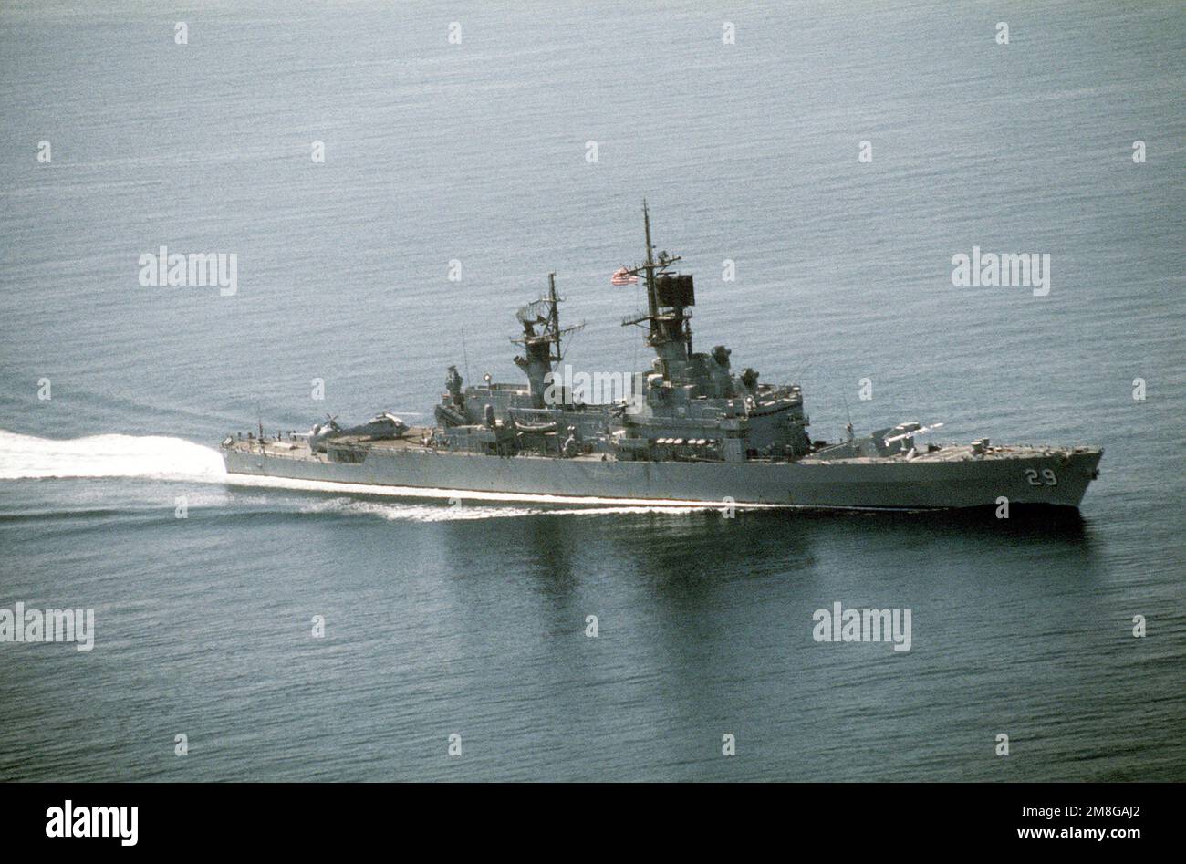 A starboard beam view of the guided missile cruiser USS JOUETT (CG-29 ...