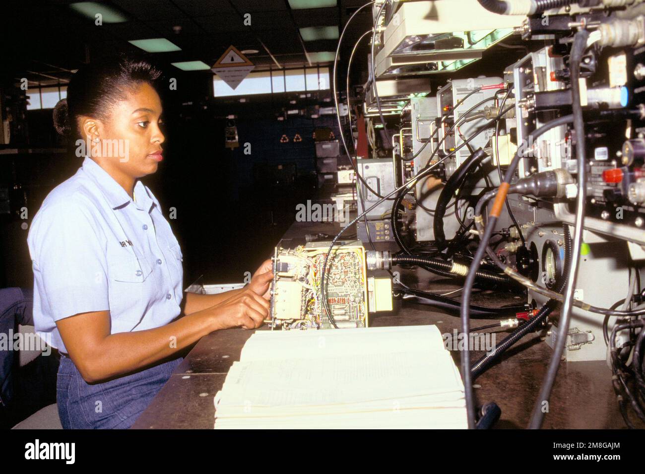 Aviation Electronics Technician AIRMAN Tina Bryan tests an air ...