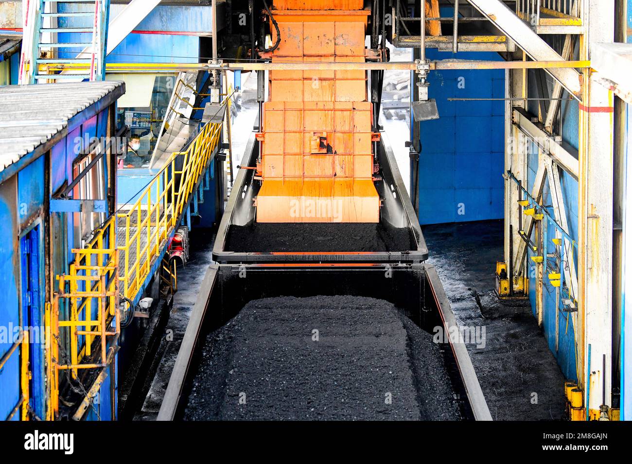 ORDOS, CHINA - JANUARY 14, 2023 - Mechanical equipment loads coal for a ...