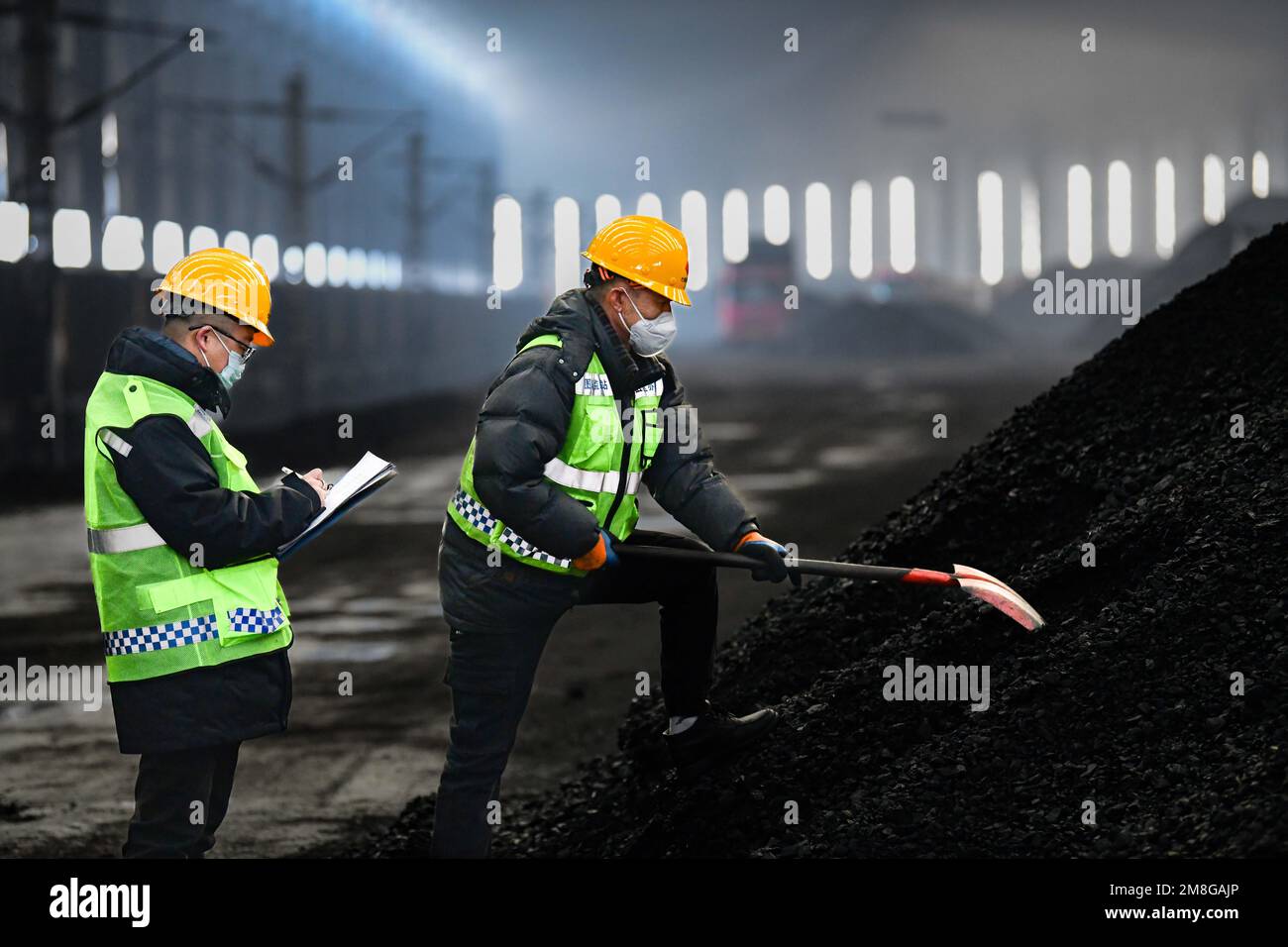 ORDOS, CHINA - JANUARY 14, 2023 - Workers check coal quality at the ...