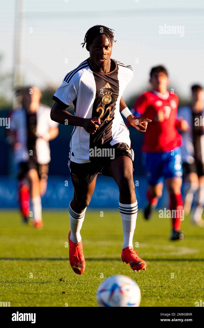 TREVOR BENEDICT of Germany they run for the ball during the game ...