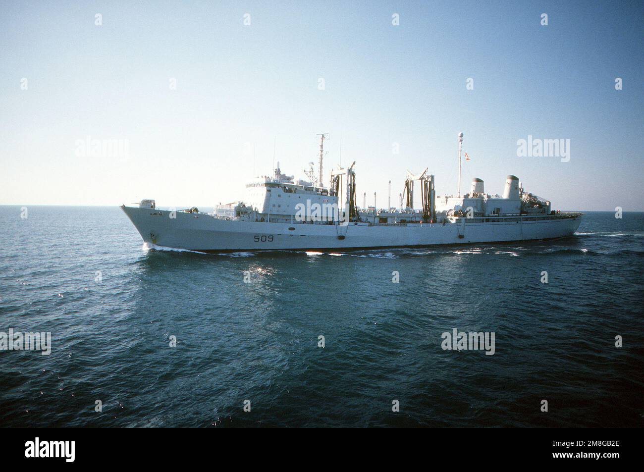 A port view of the Canadian operational support ship HMS PROTECTEUR ...