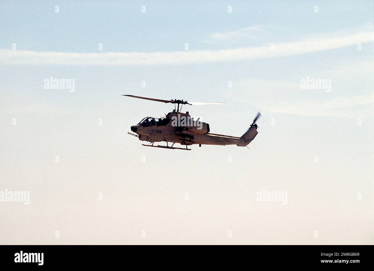 A AH-1W Sea Cobra helicopter of Marine Utility/Attack Squadron 369 ...