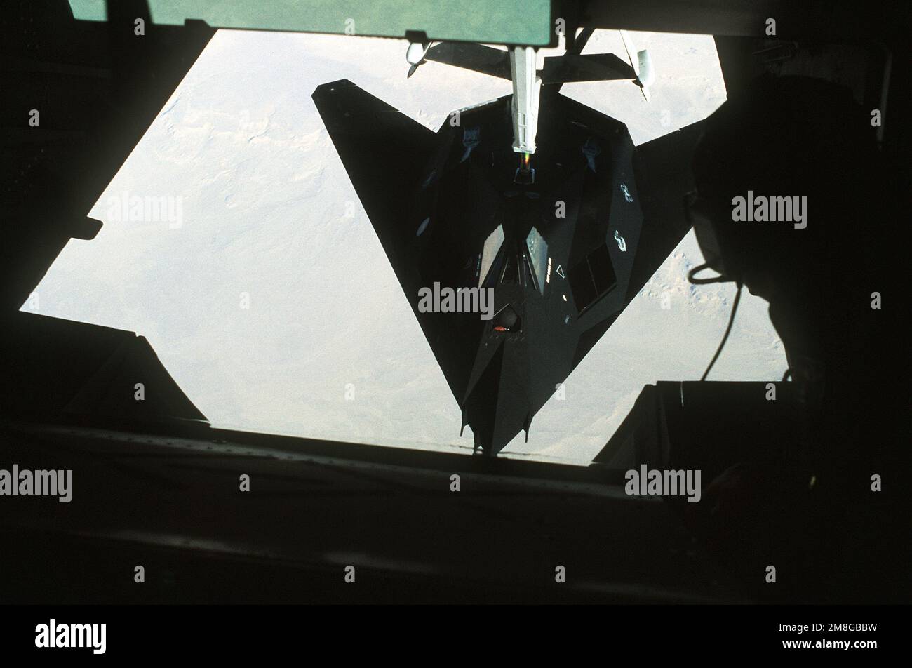 A 37th Tactical Fighter Wing F-117A Stealth fighter aircraft refuels ...