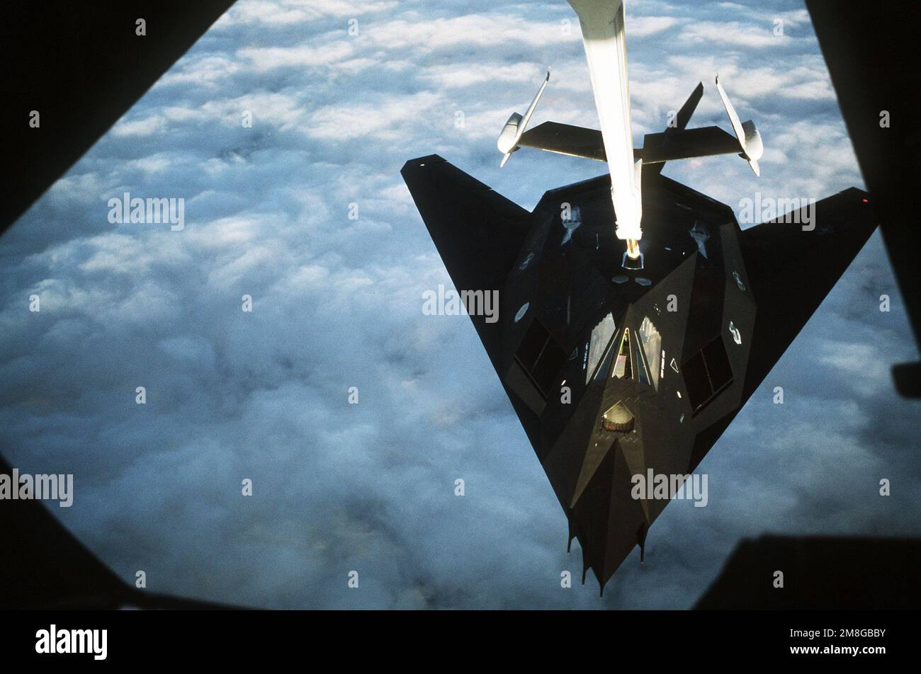 A 37th Tactical Fighter Wing F-117A Stealth fighter aircraft refuels ...
