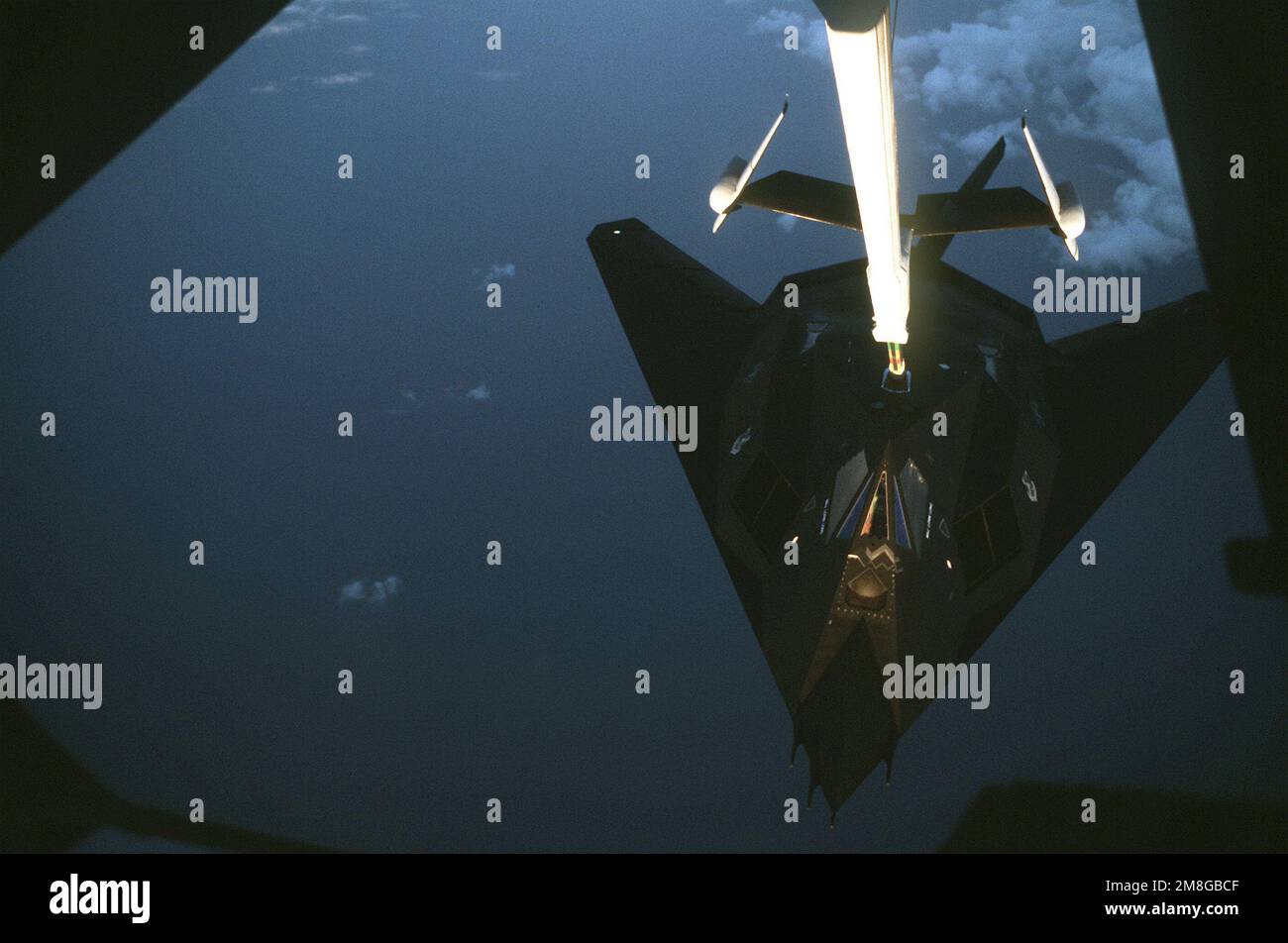 A 37th Tactical Fighter Wing F-117A Stealth fighter aircraft refuels ...