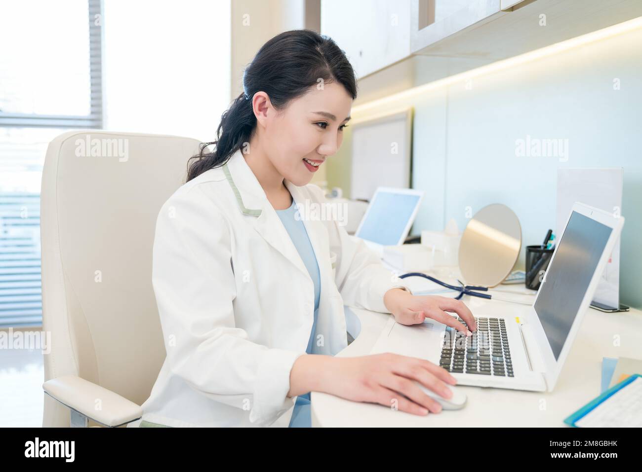 Professional female doctor portraits Stock Photo - Alamy