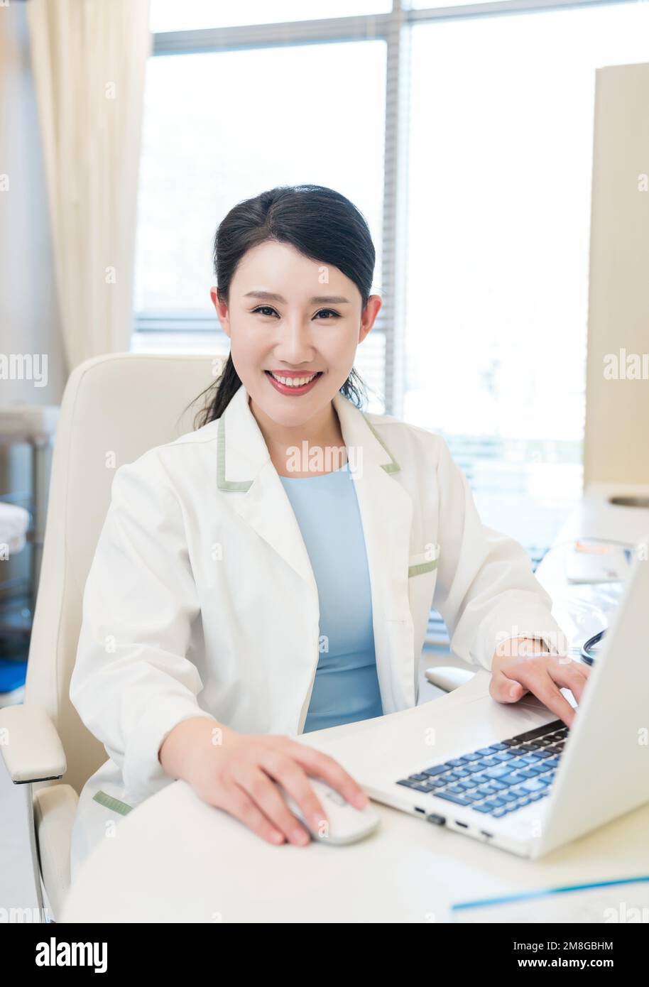 Professional female doctor portraits Stock Photo - Alamy