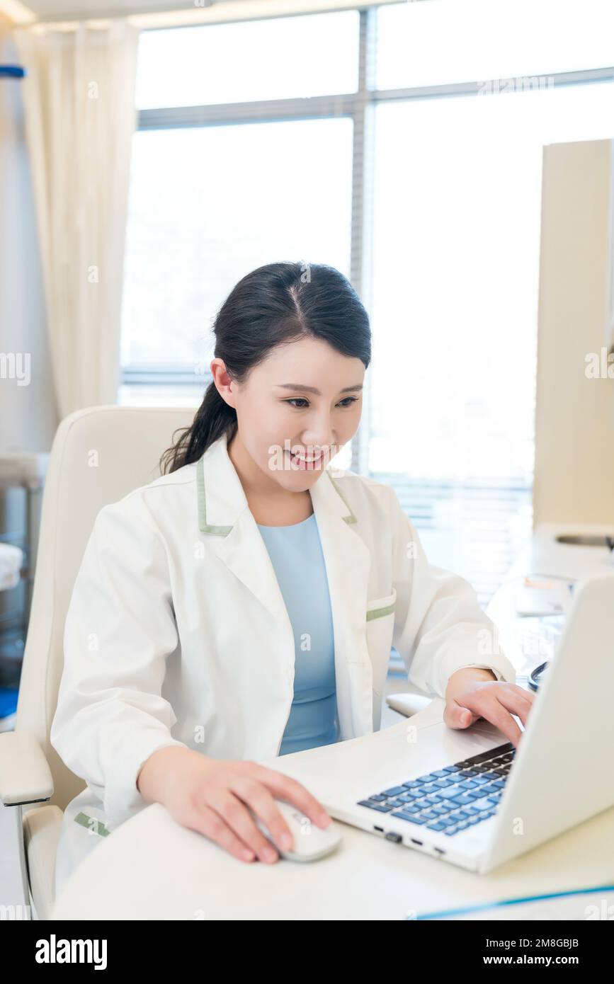 Professional female doctor portraits Stock Photo - Alamy