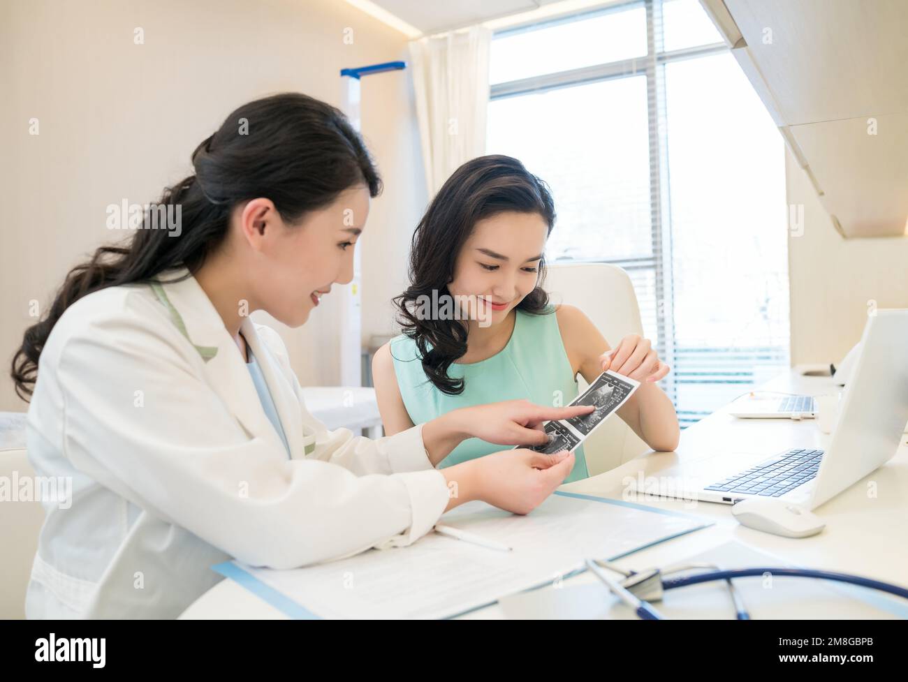 Obstetrics and gynecology doctors received expectant mothers Stock ...