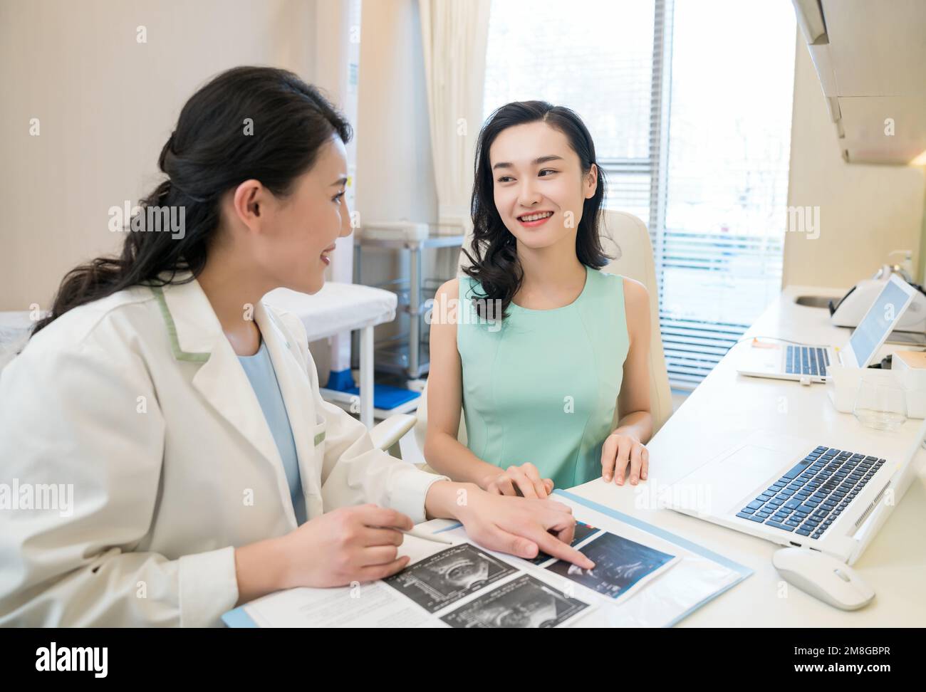 Obstetrics and gynecology doctors received expectant mothers Stock ...