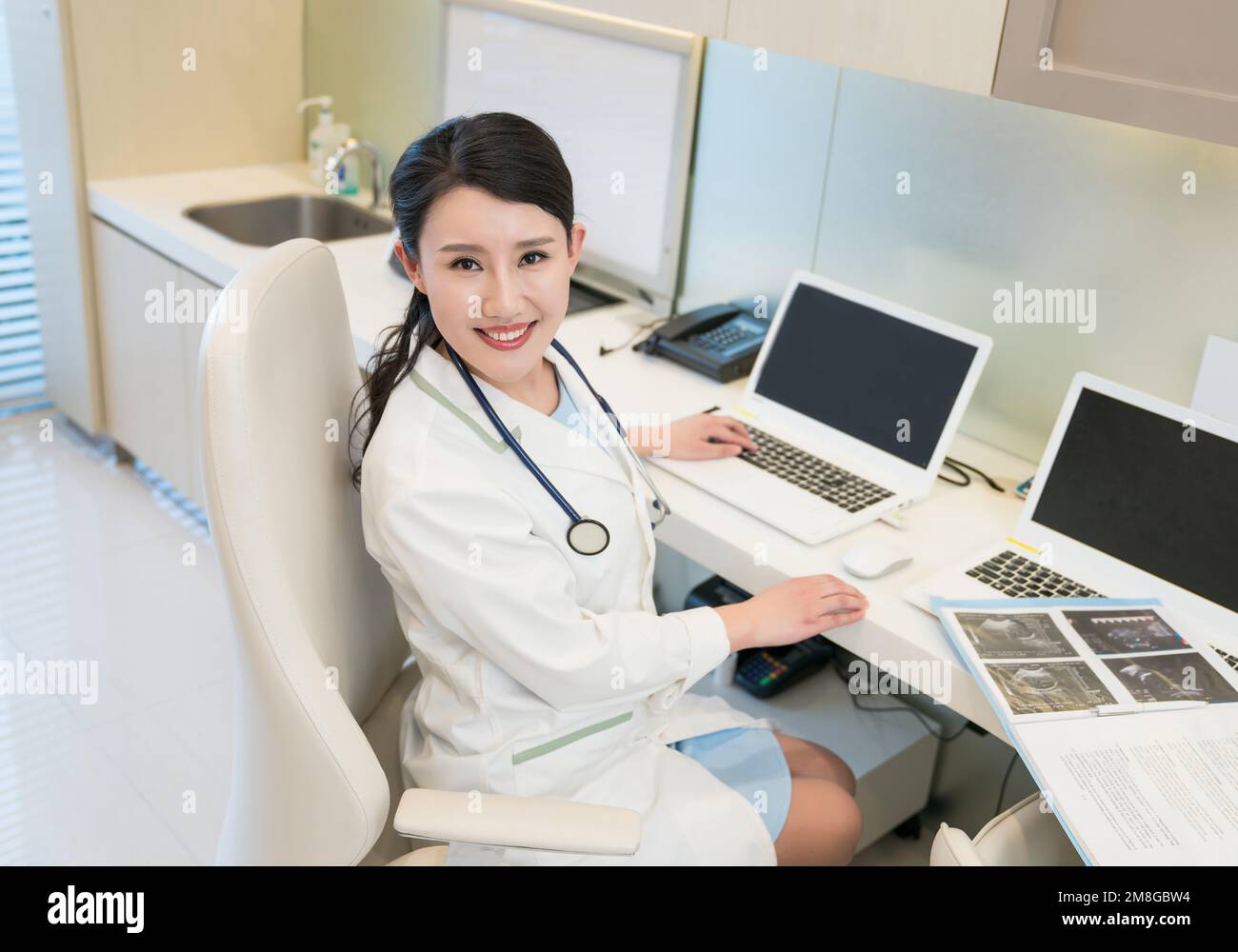 Professional female doctor portraits Stock Photo - Alamy