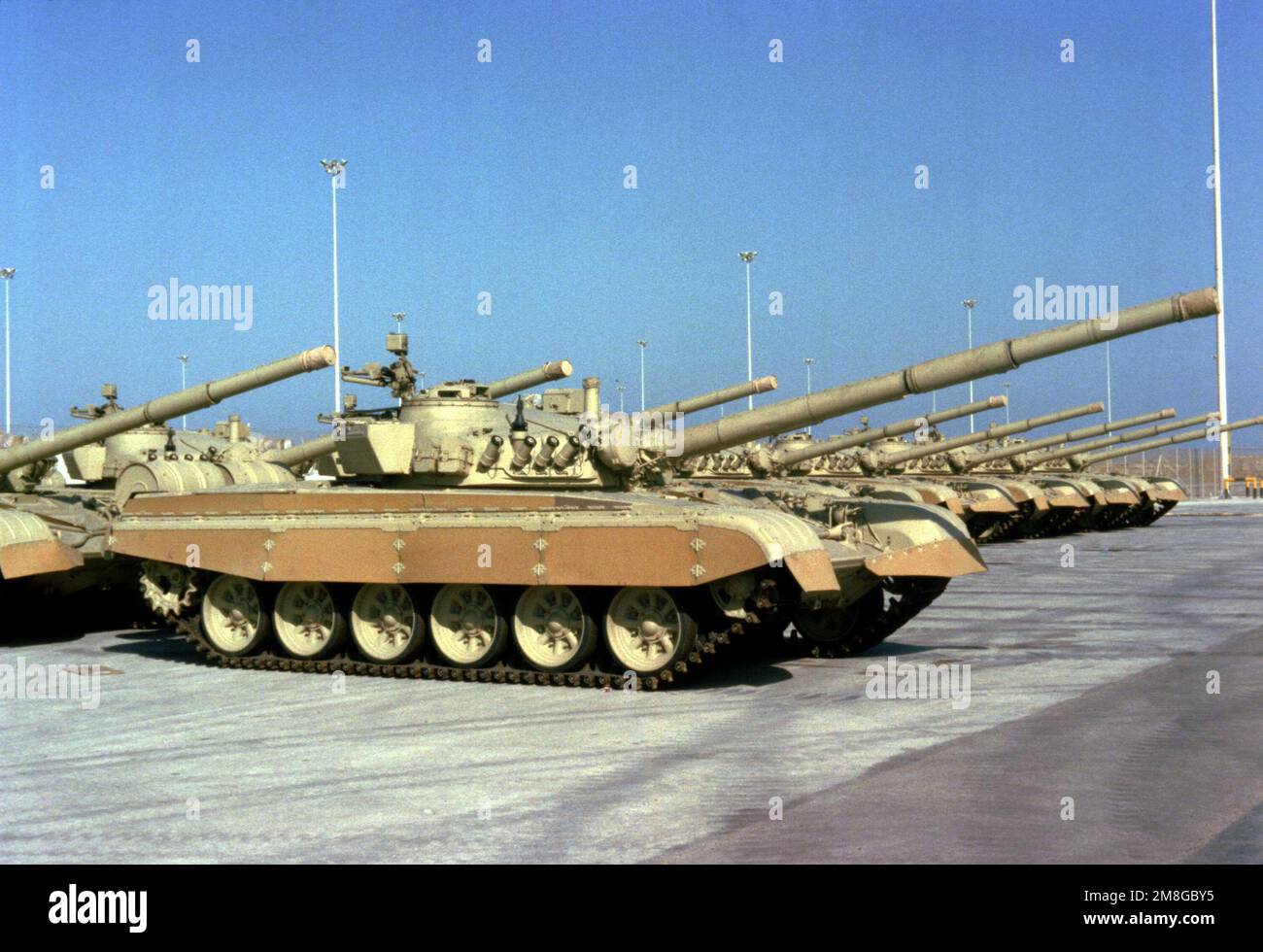 Kuwaiti T-72 main battle tanks, made in Yugoslavia, are stored at a ...