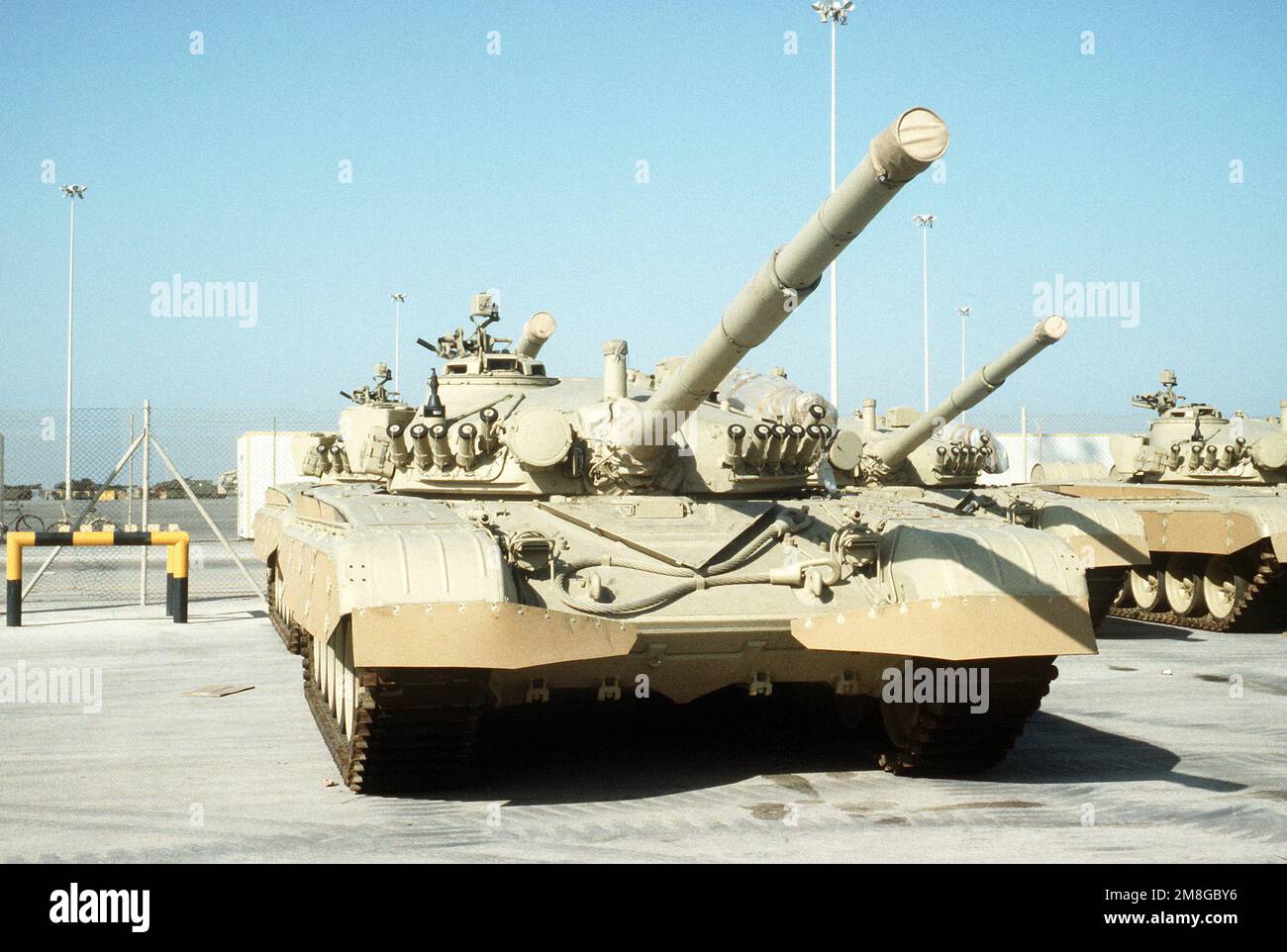 Kuwaiti T-72 main battle tanks, made in Yugoslavia, are stored at a ...