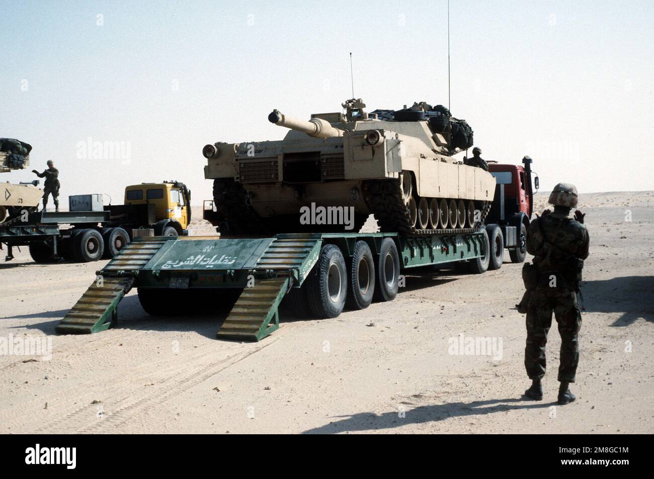 An M-1A1 Abrams main battle tank arrives on a Saudi transport truck ...