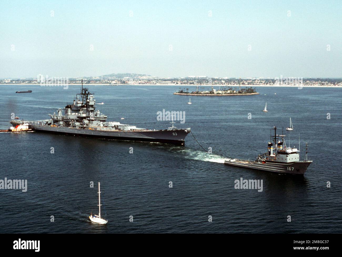 The recently decommissioned battleship USS MISSOURI (BB 63) is towed ...