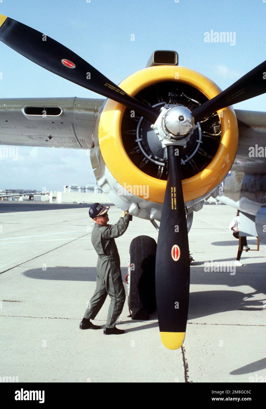Ed Gustafson checks out a restored B-25 Mitchell bomber parked on the ...