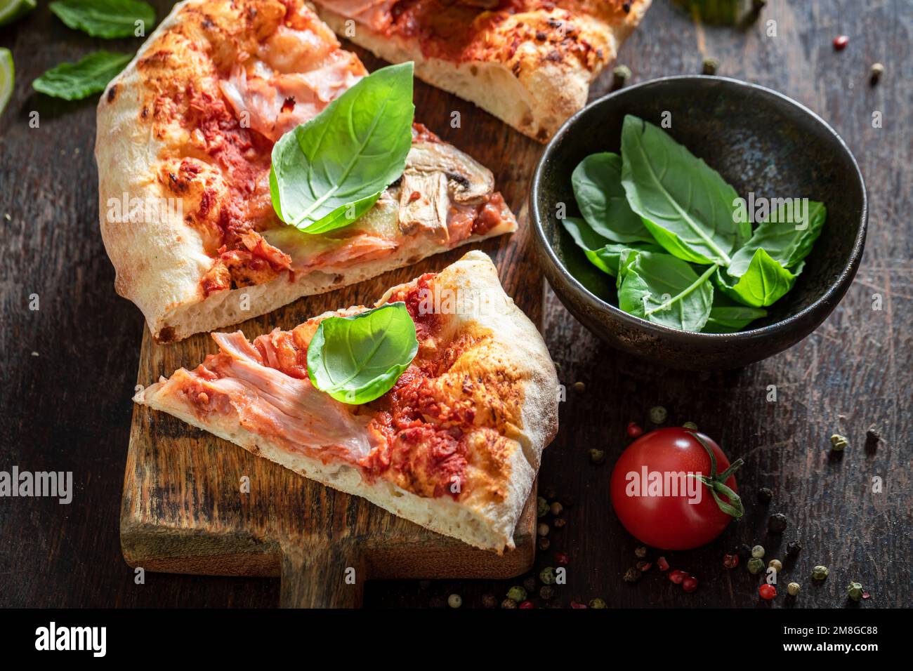 Traditional Capricciosa pizza baked in the oven. Traditional Italian ...