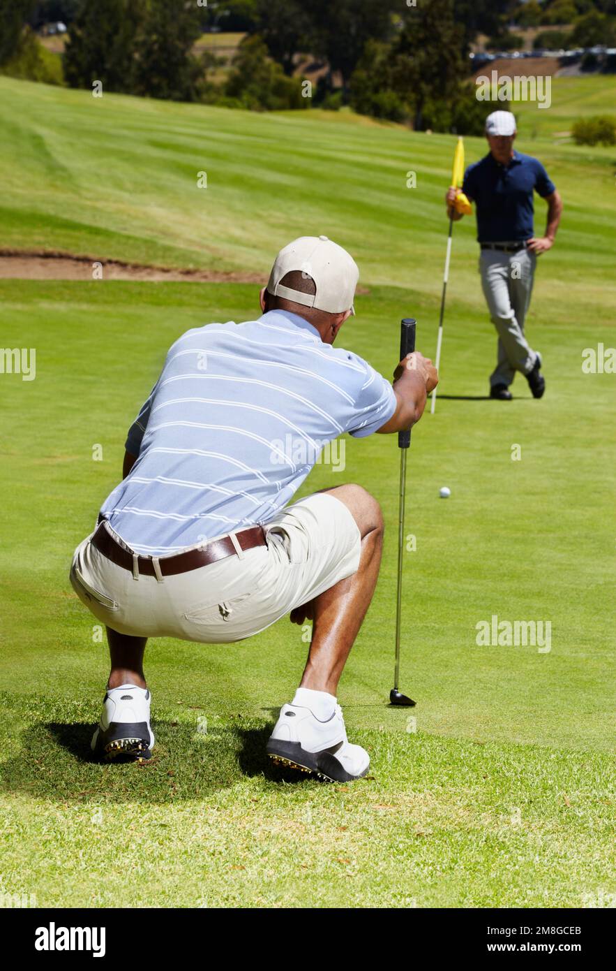 Man long golf putt ball hi-res stock photography and images - Alamy