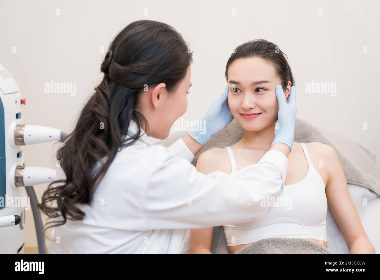 Professional reception young woman Stock Photo - Alamy
