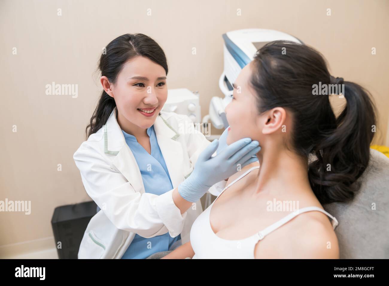 Professional reception young woman Stock Photo - Alamy