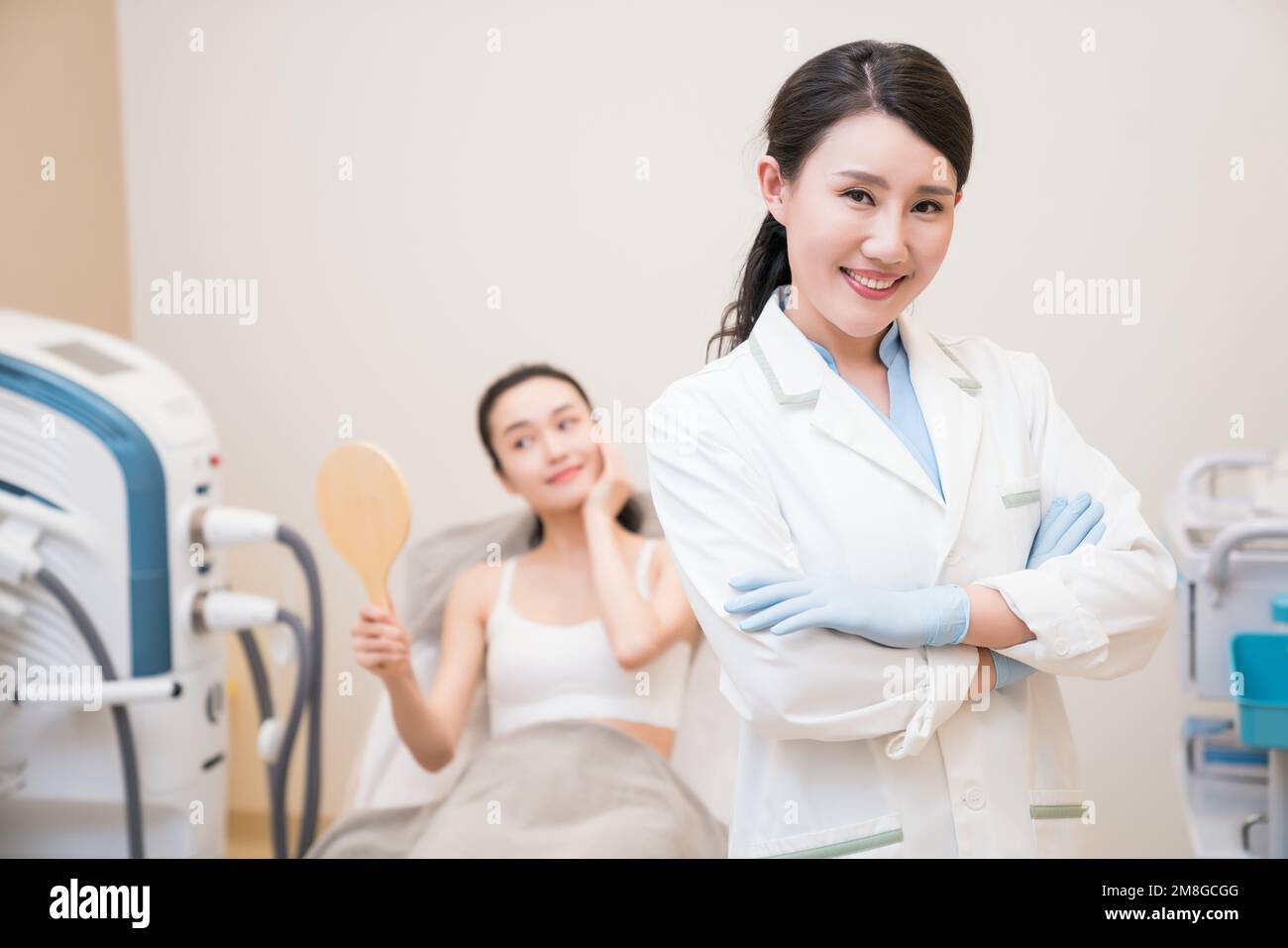 Professional reception young woman Stock Photo - Alamy