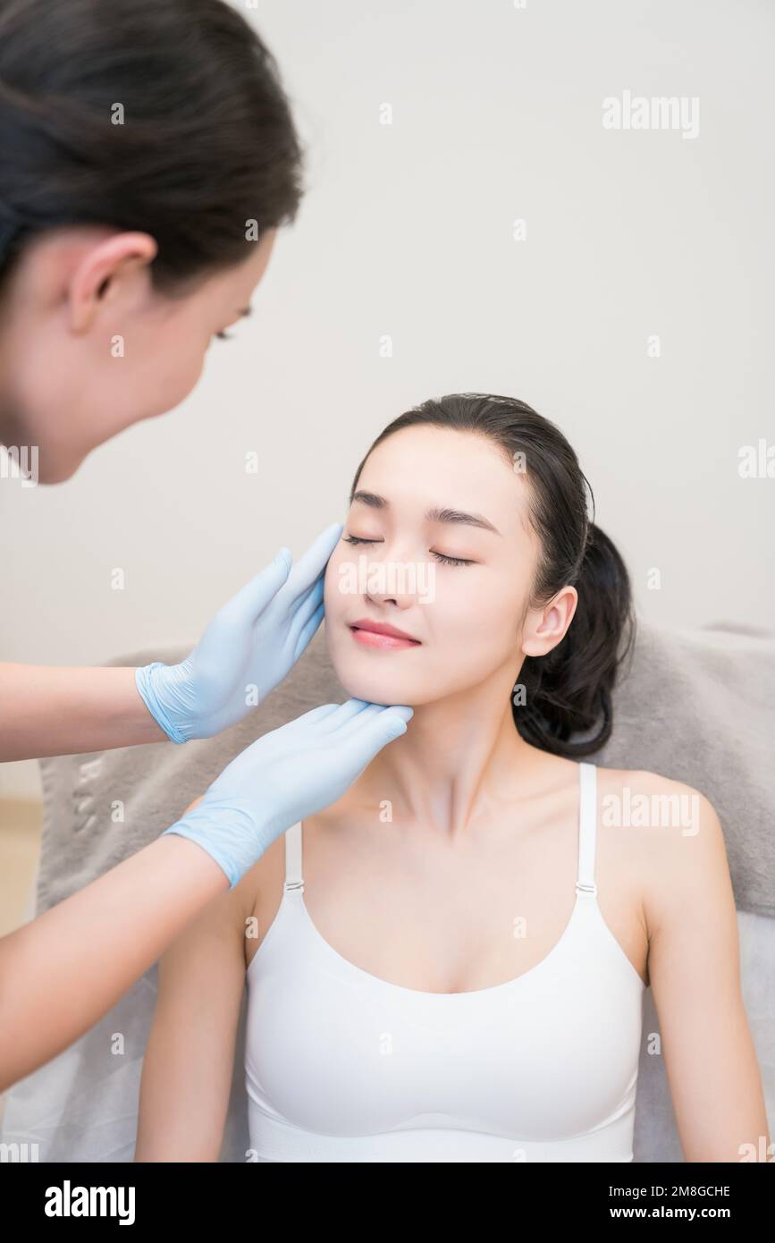 Professional reception young woman Stock Photo - Alamy