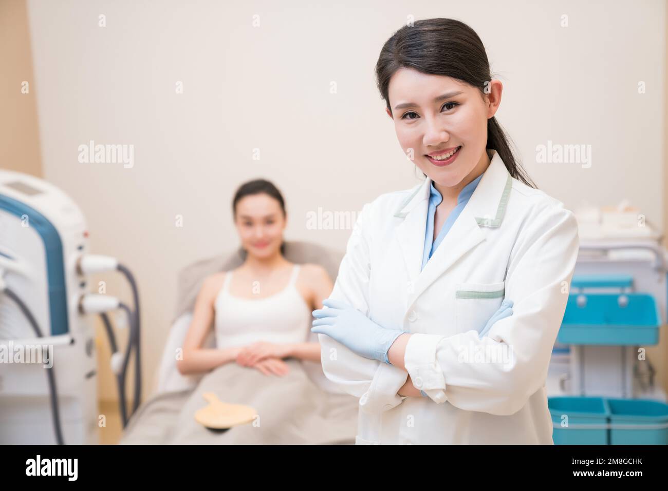 Professional reception young woman Stock Photo - Alamy