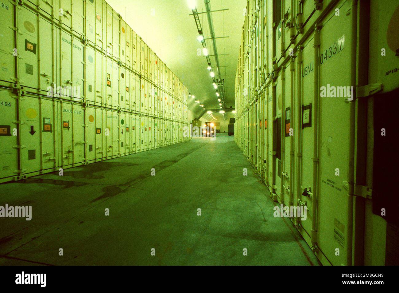 Containers holding components of a fleet hospital are stored in a ...