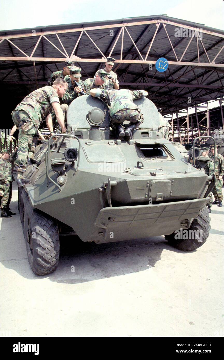 Marines from the dock landing ship USS WHIDBEY ISLAND (LSD-41) inspect ...