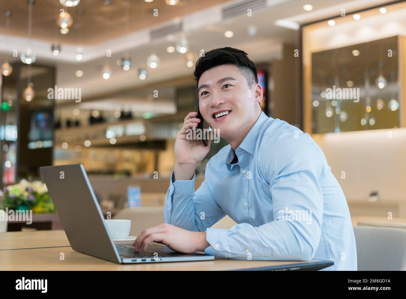 Business men in the Internet cafe Stock Photo - Alamy