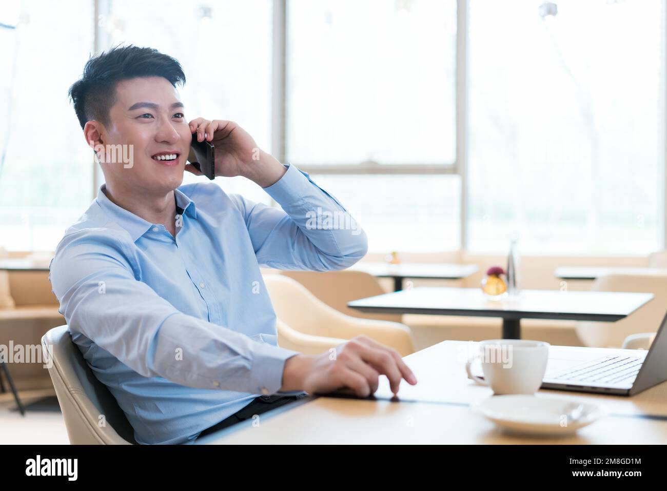 Business men in the Internet cafe Stock Photo - Alamy