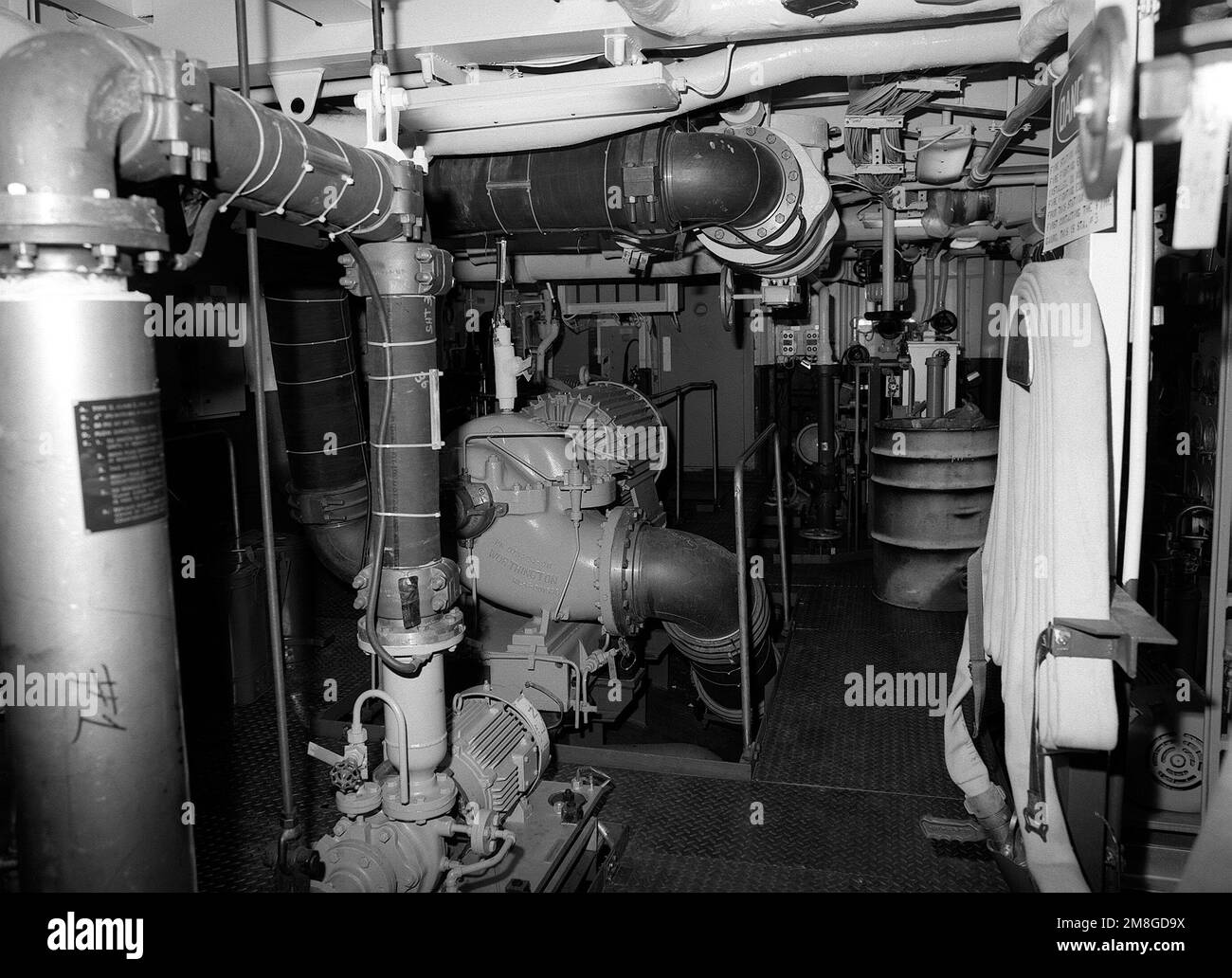 A view of the auxiliary machinery room No. 1 aboard the guided missile ...