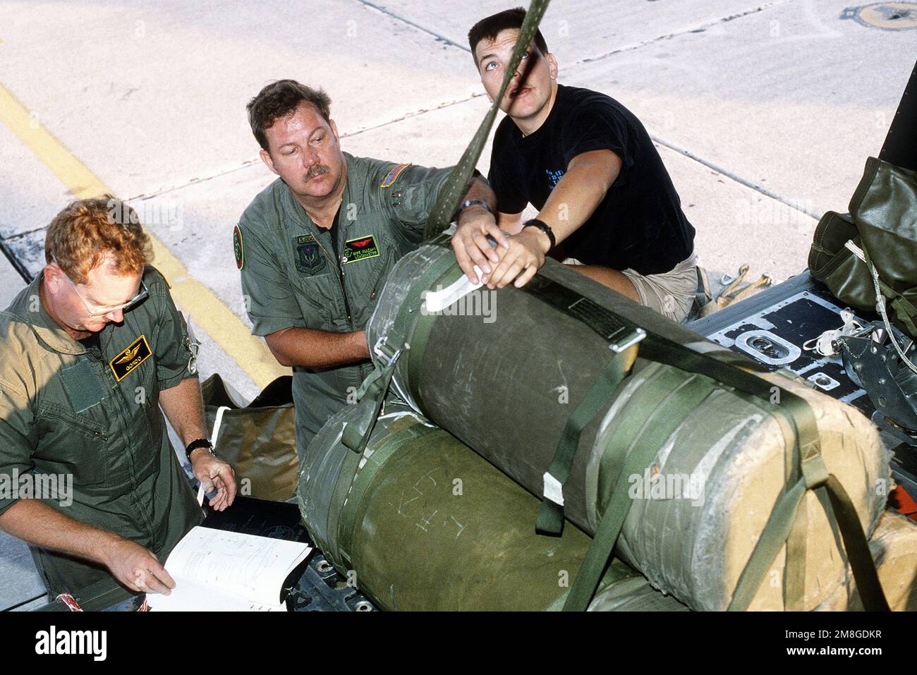 Members of the 8th Special Operations Squadron prepare a 1ST Special ...