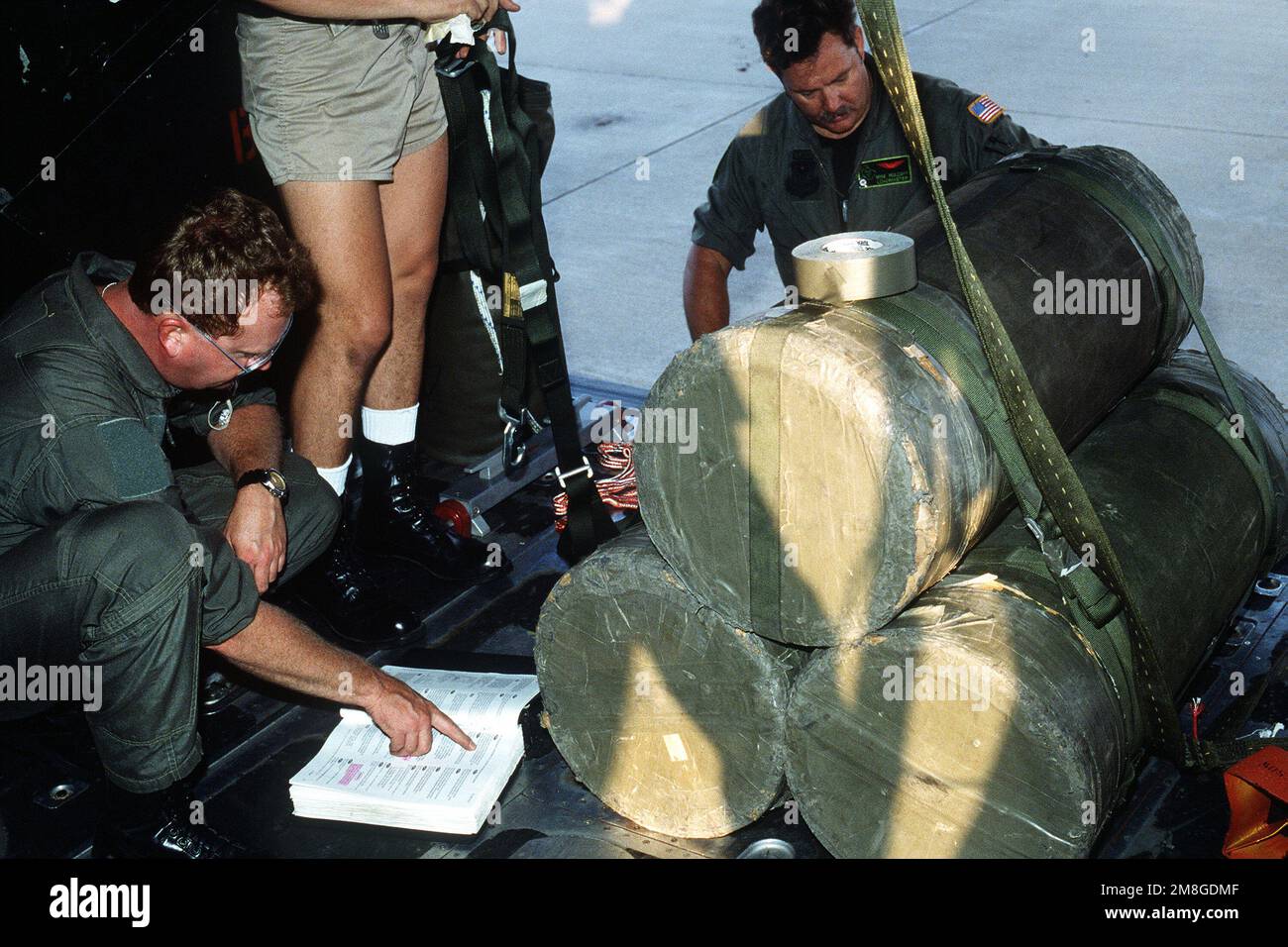 Members of the 8th Special Operations Squadron prepare a 1ST Special ...